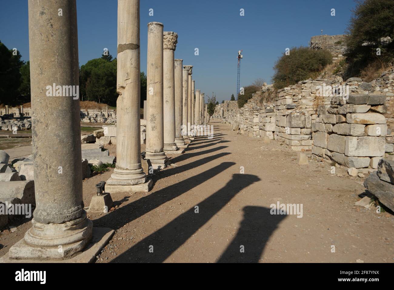 Ancient Roman columns along road in Ephesus city, Turkey Stock Photo ...