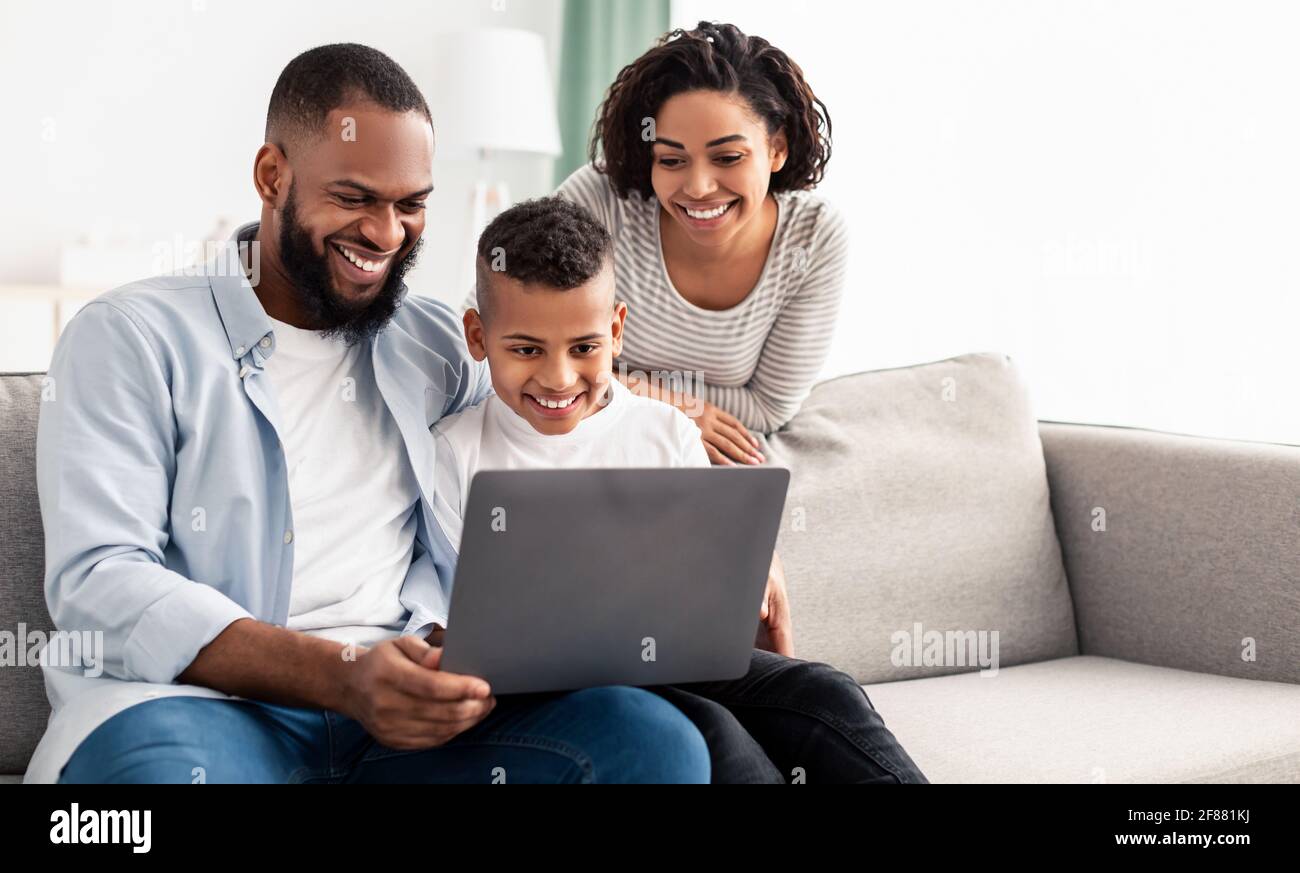 Boy using computer black children hi-res stock photography and images ...