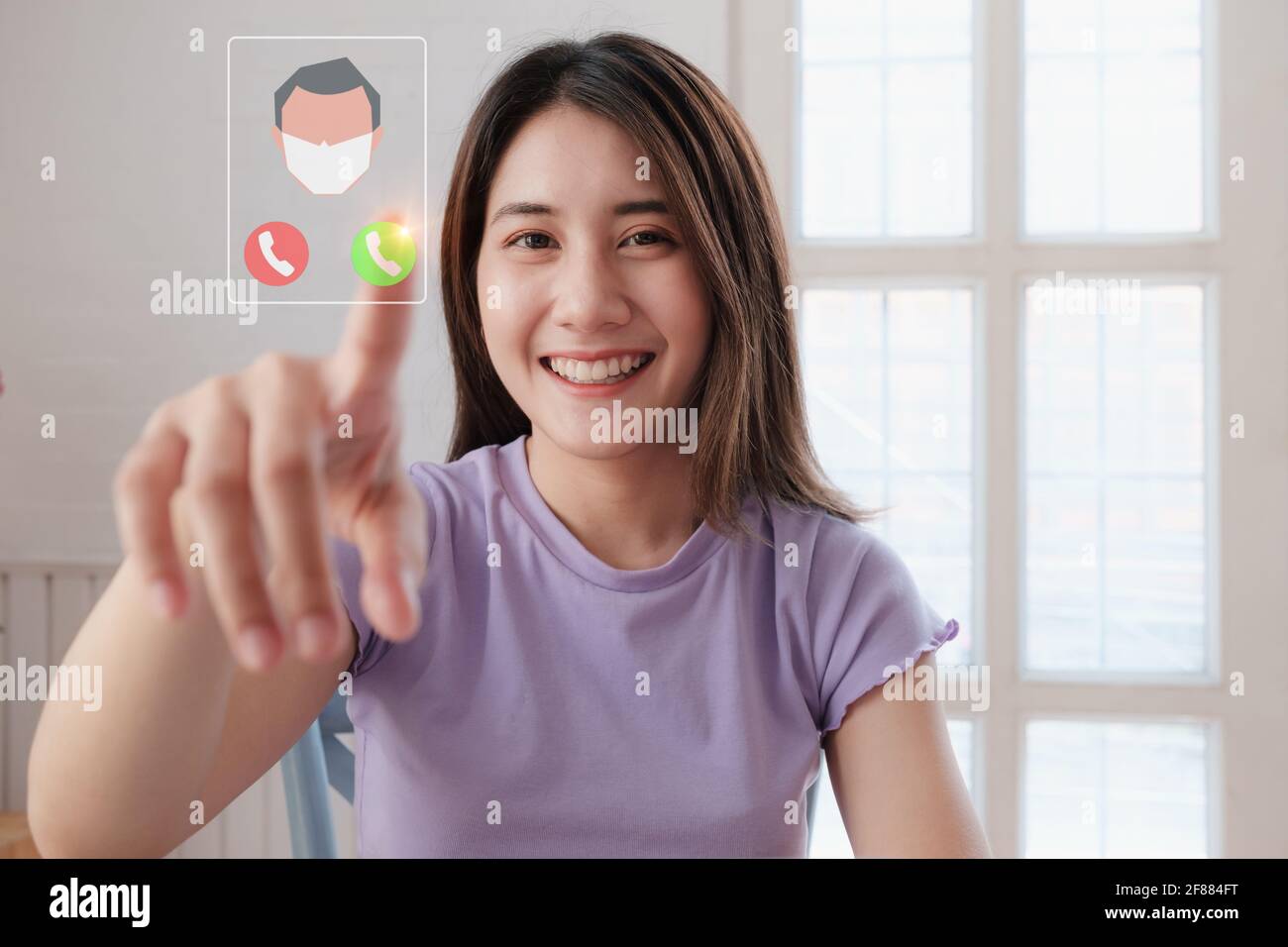 Portrait of beautiful woman and smiling using video call on visual ...
