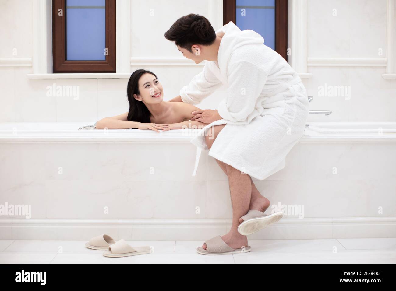 Men talking bathroom hi-res stock photography and images - Alamy