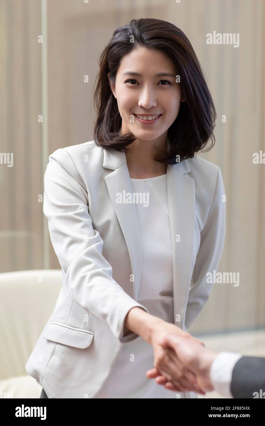 Interviewer and interviewee standing hi-res stock photography and ...