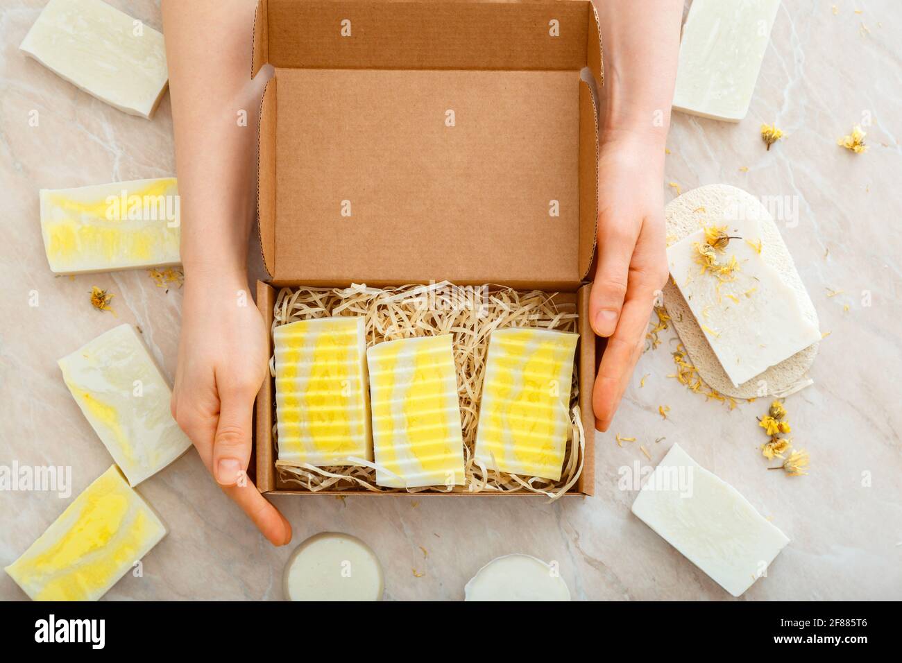 Gift box with set of natural soap in female hands. DIY soaps kit. Many ...