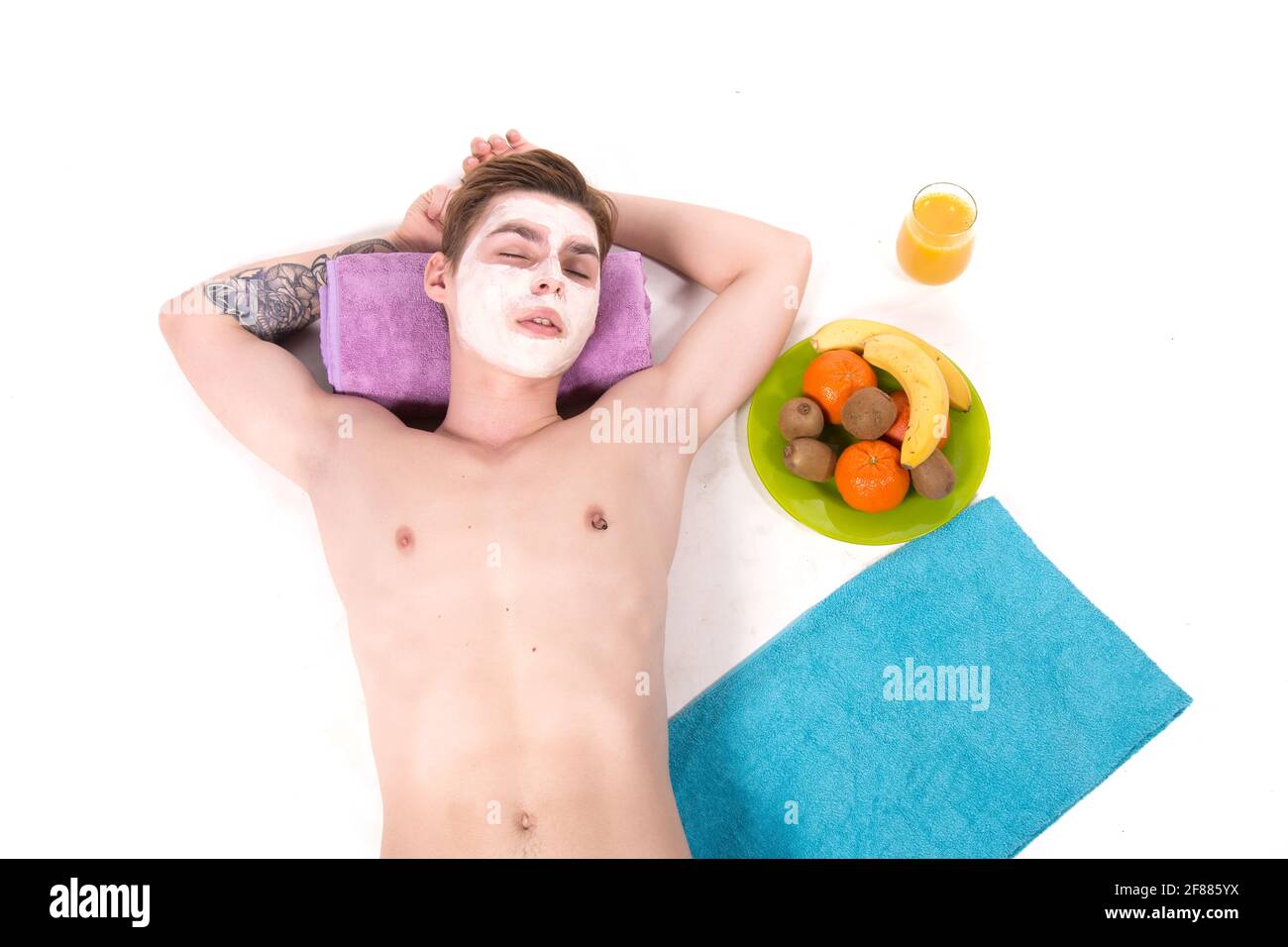 Male beauty. Attractive guy and spa. White background Stock Photo - Alamy