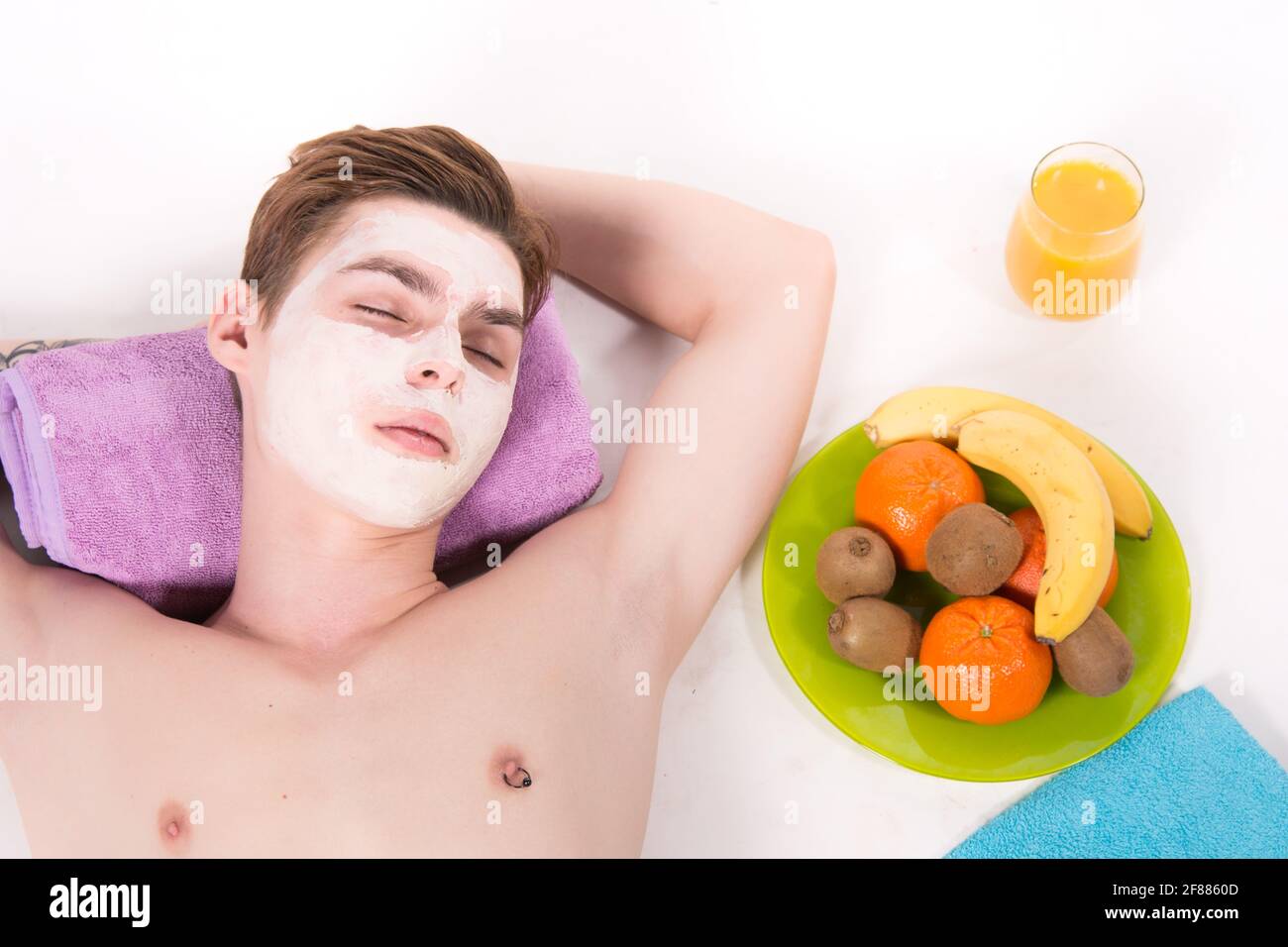 Male beauty. Attractive guy and spa. White background Stock Photo - Alamy