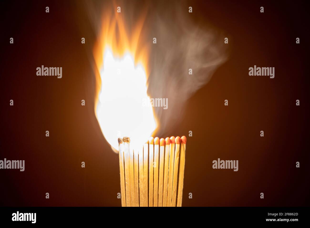 close up of burning matches against dark background Stock Photo - Alamy