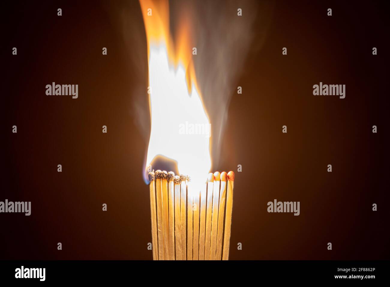 close up of burning matches against dark background Stock Photo - Alamy