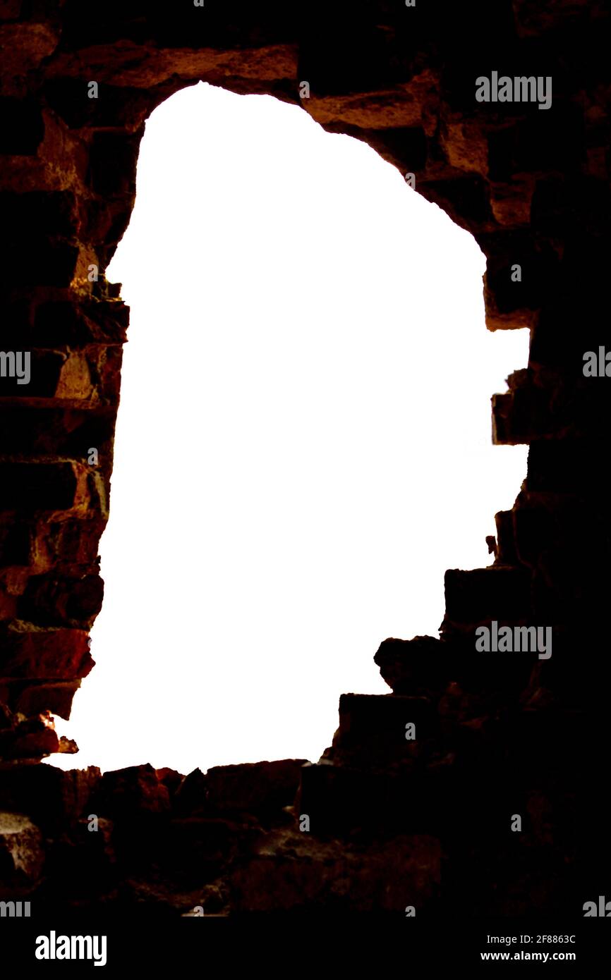 hole in a brick wall, no focus, white sky as background Stock Photo - Alamy