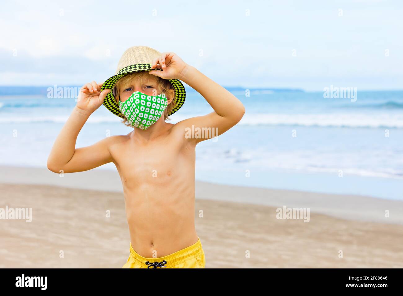 People on beach face mask face masks hi-res stock photography and ...