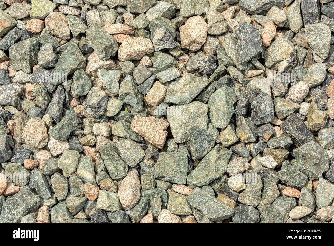 Mixture of natural rocks decorative texture background Stock Photo - Alamy