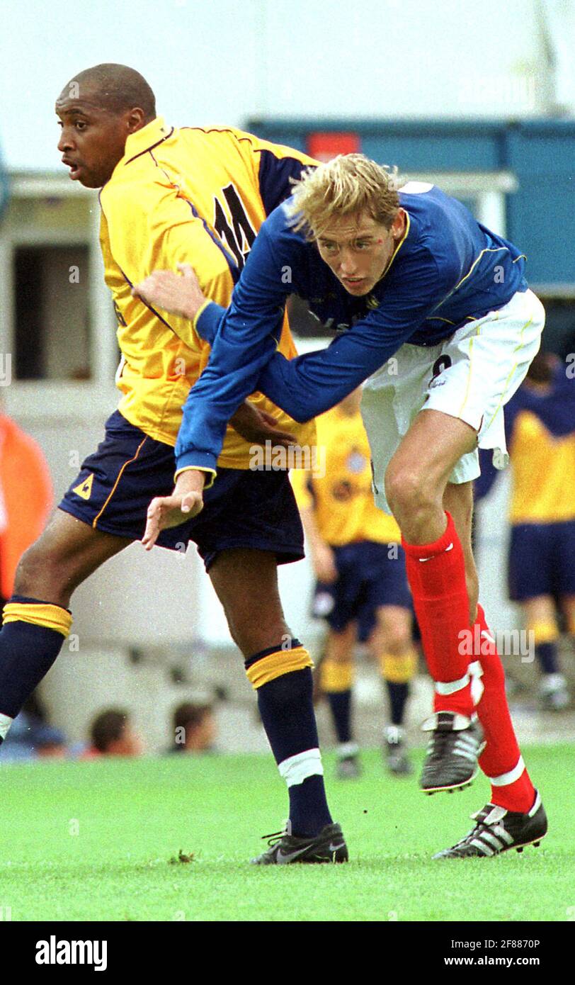 PETER CROUCH (PORTSMOUTH) TANGLES WITH LEICESTER NO14, ANDY IMPEY, AT ...