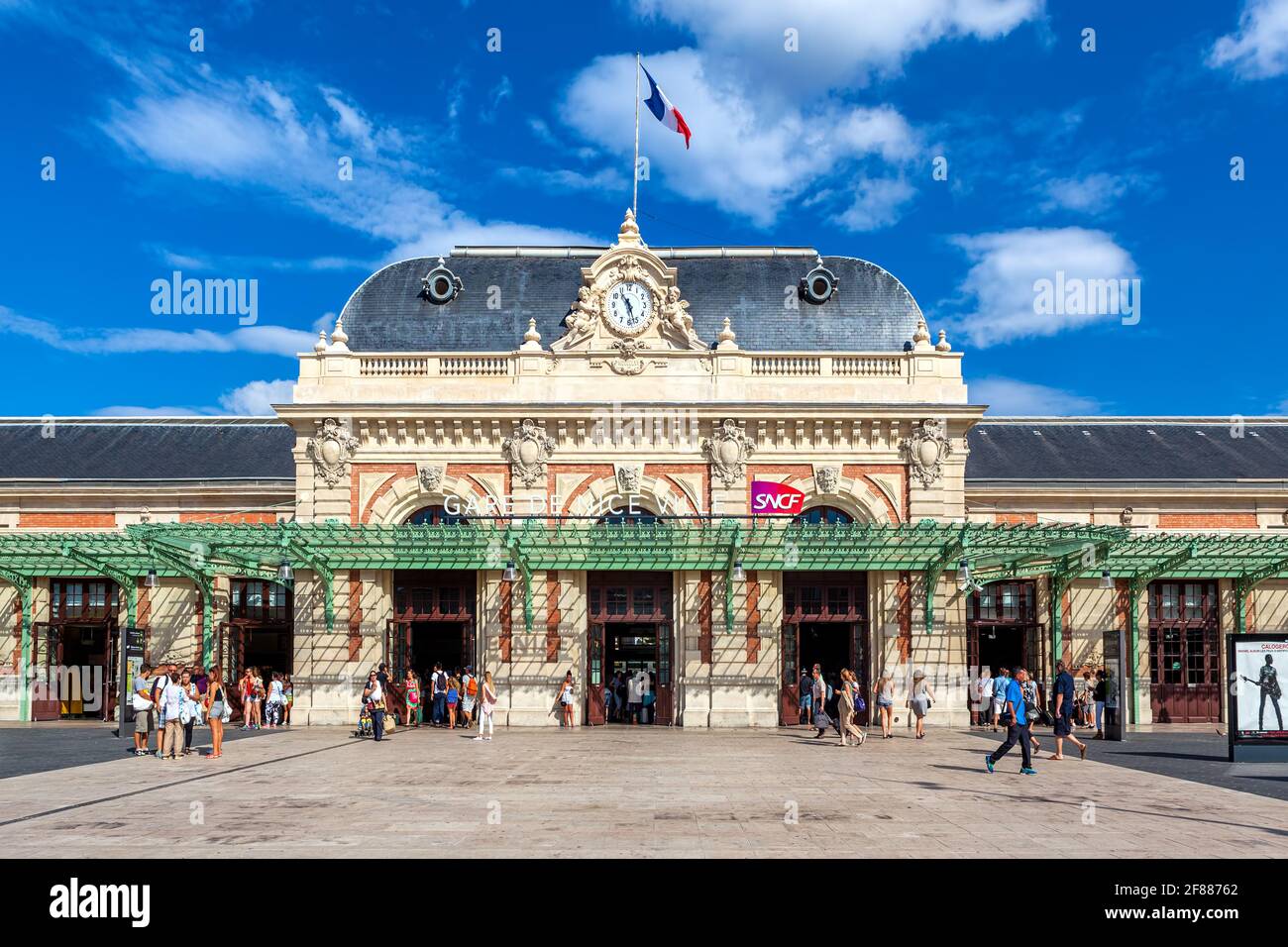 People walking on the street in front of Nice-Ville - main railway ...