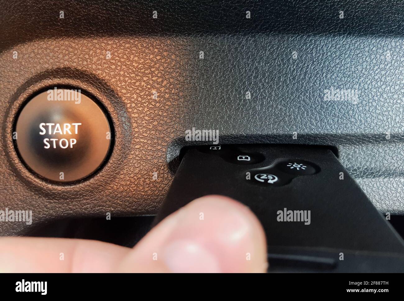 Start-stop button and car key card with hands-free function Stock Photo ...