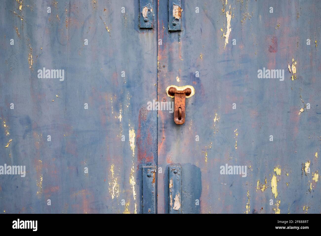 Old lock of the metal door. Rusty old metal texture with remnants of ...