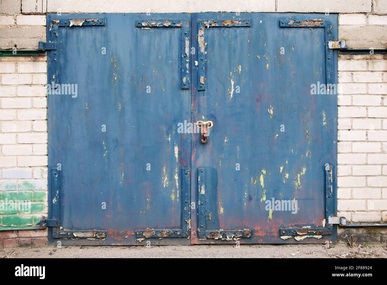Old lock of the metal door. Rusty old metal texture with remnants of ...