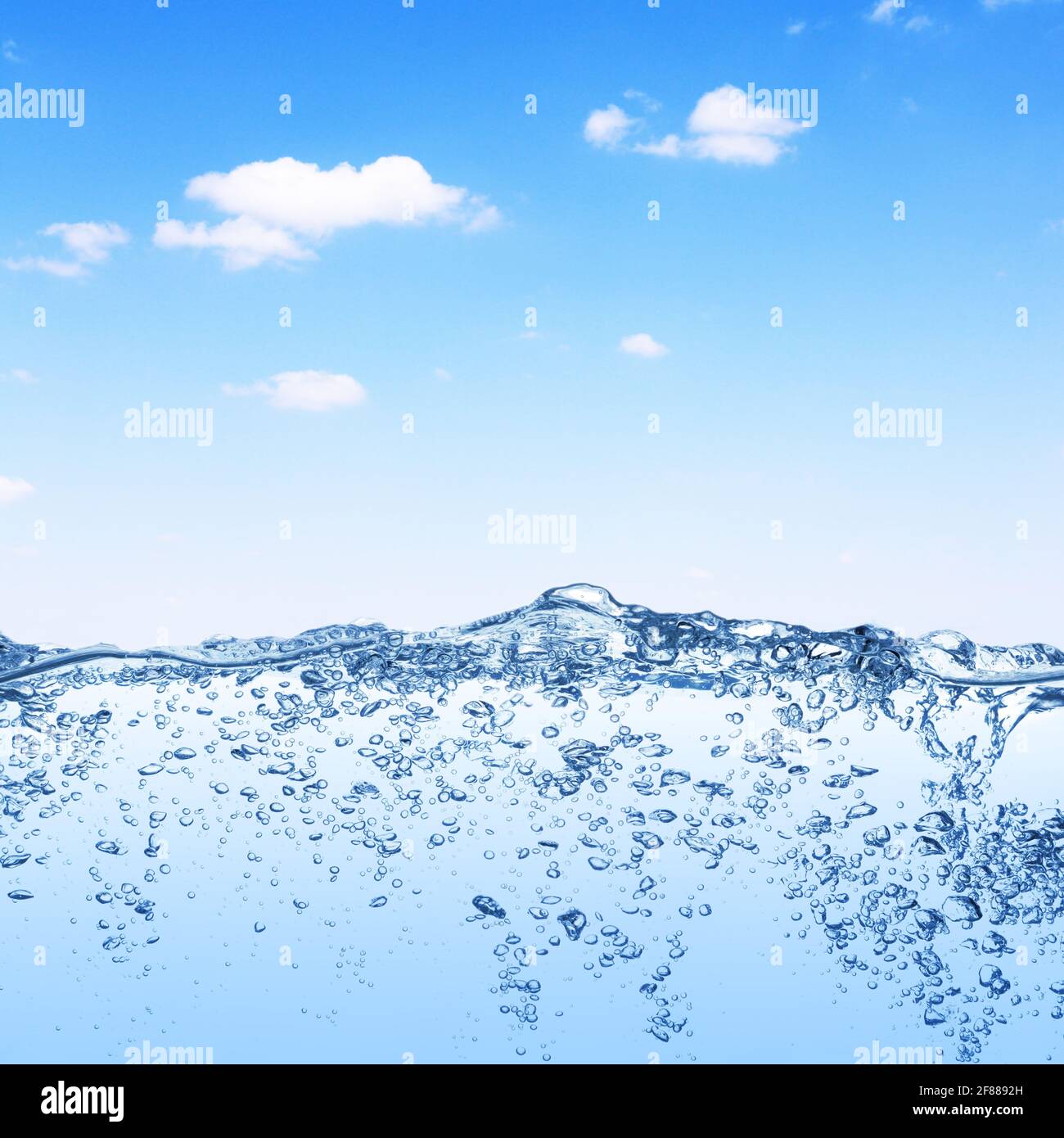 Clear water surface under the blue sky Stock Photo - Alamy