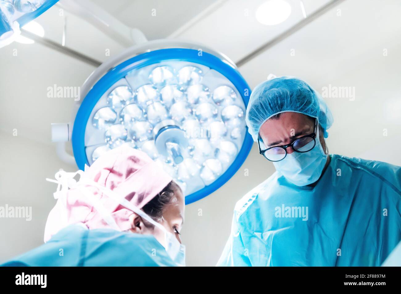 Professional medical team performing surgery at the hospital Stock ...