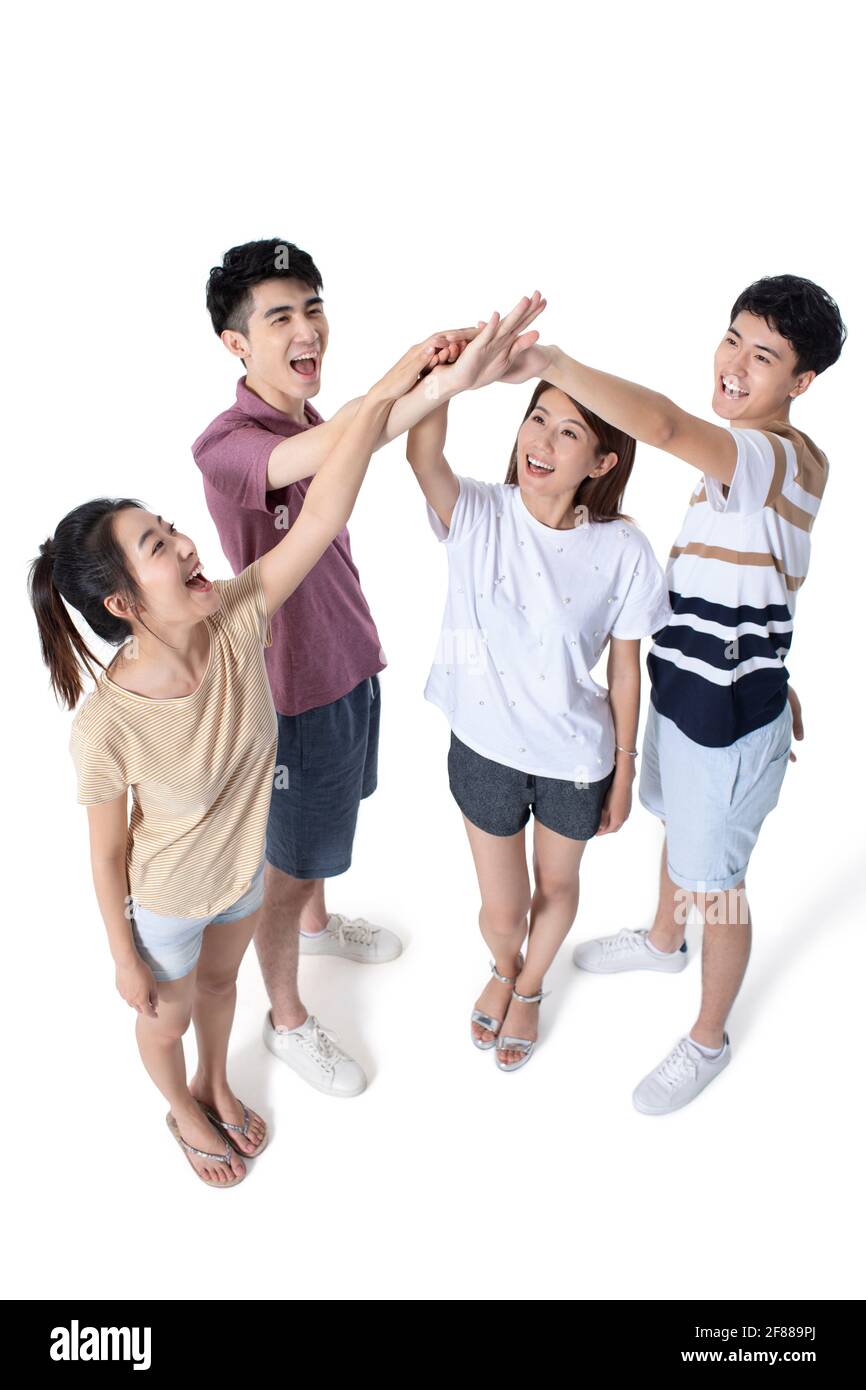 Cheerful young friends getting together Stock Photo - Alamy