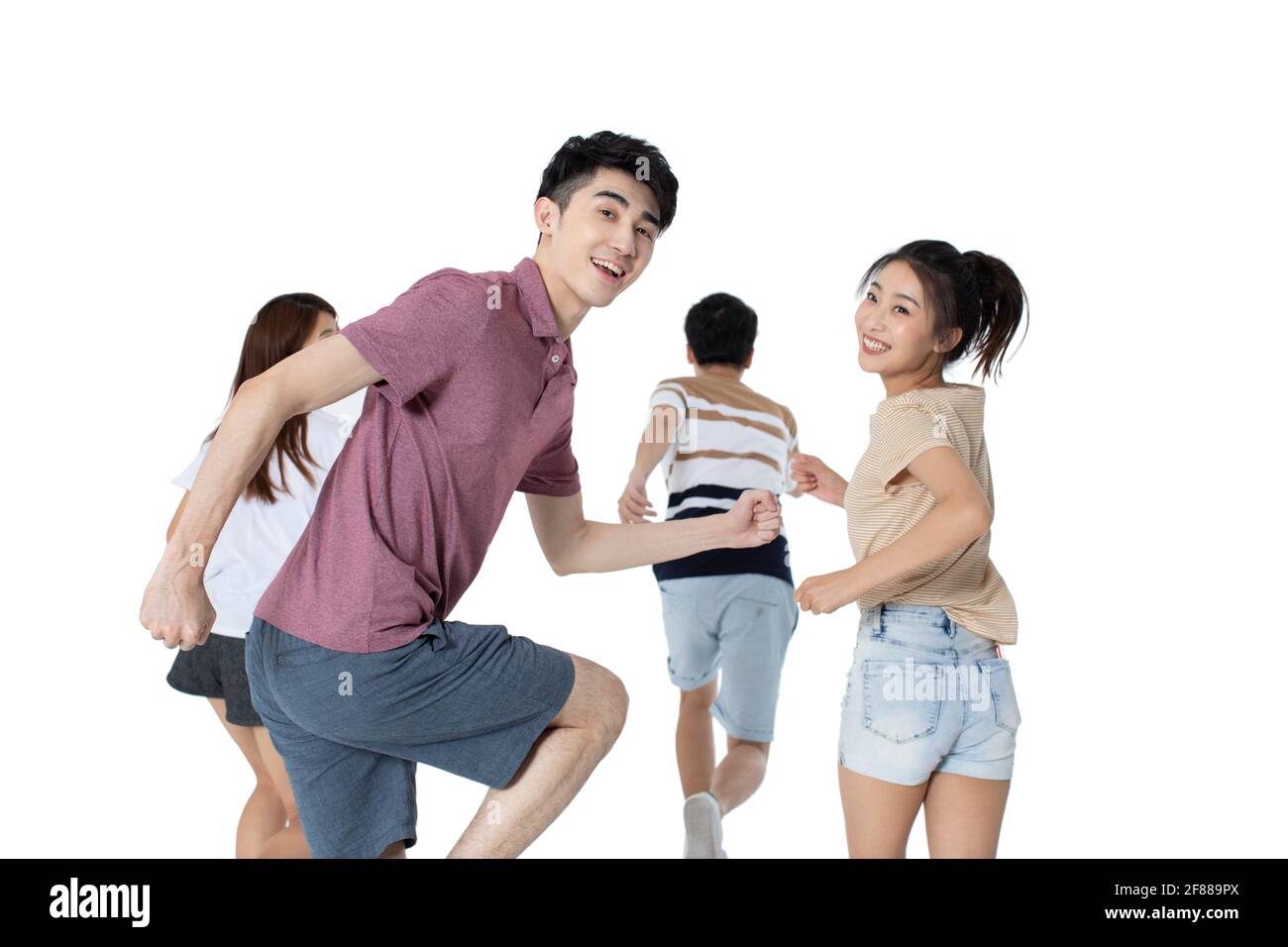 Back view of four friends running hi-res stock photography and images ...