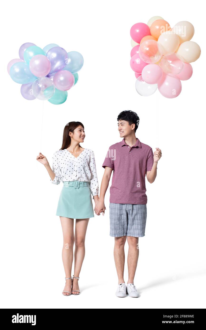 Holding balloon flying away Cut Out Stock Images & Pictures - Alamy