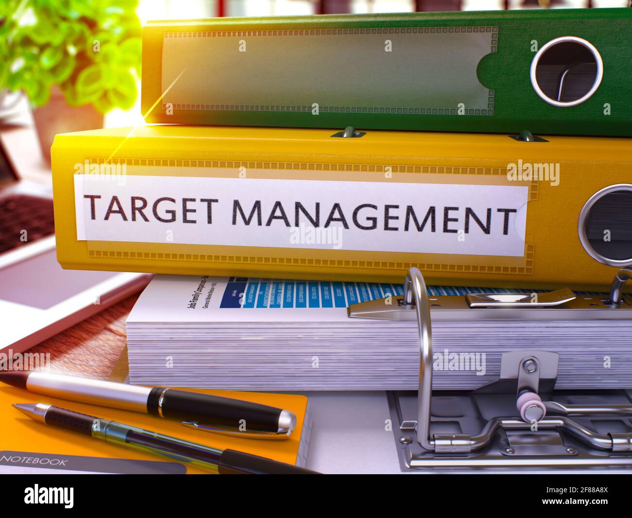 Target Management - Yellow Ring Binder on Office Desktop with Office ...