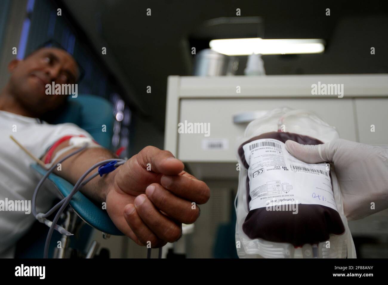 salvador, bahia / brazil - april 06, 2017: Person is seen making blood ...