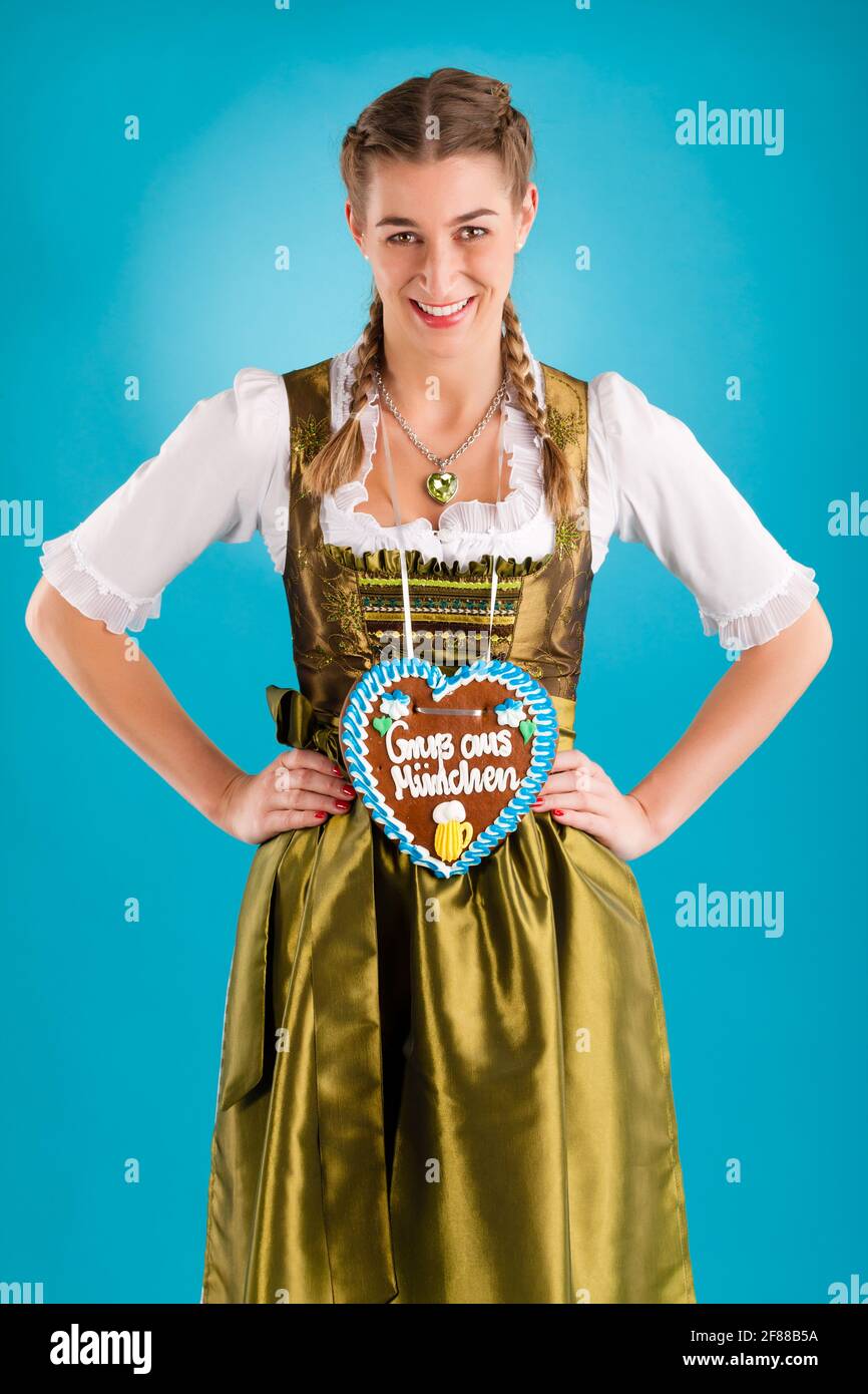 Young woman in traditional Bavarian clothes - dirndl or tracht with a ...