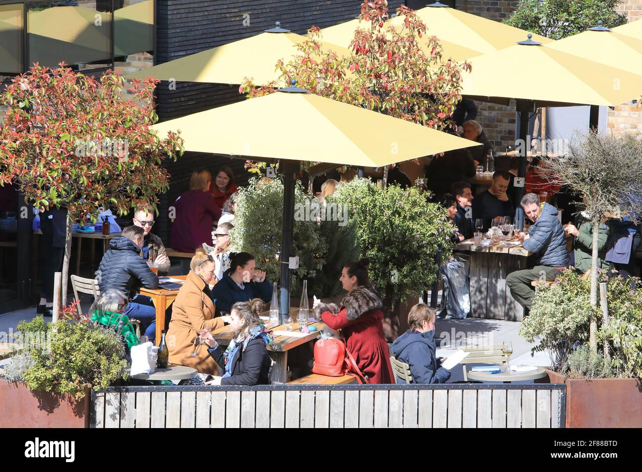 London, UK, April 12th 2021. The Lighterman gasto pub terrace by the ...