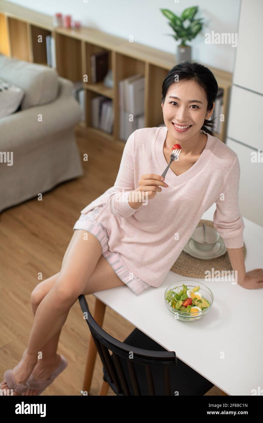 Women eating boiled egg hi-res stock photography and images - Alamy