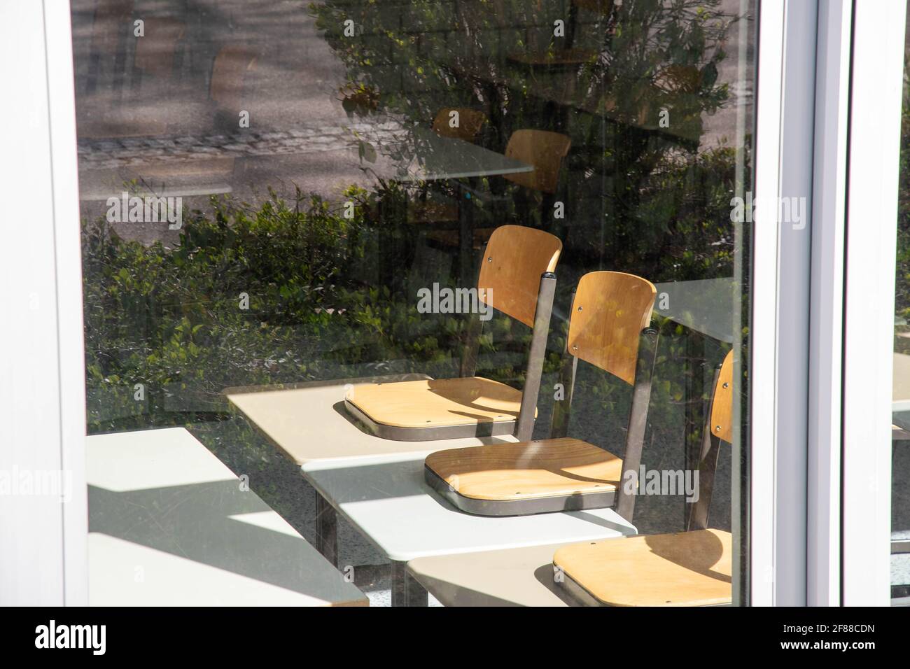 Empty classroom photographed through the window Stock Photo - Alamy