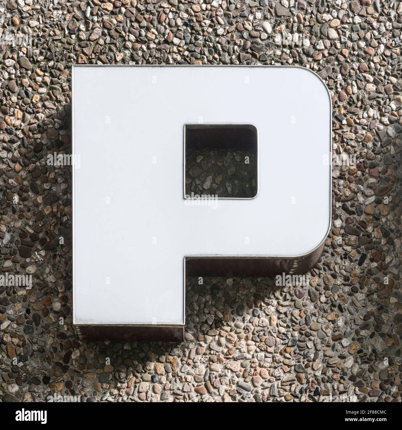 White letter P from the 70s on a concrete wall Stock Photo - Alamy
