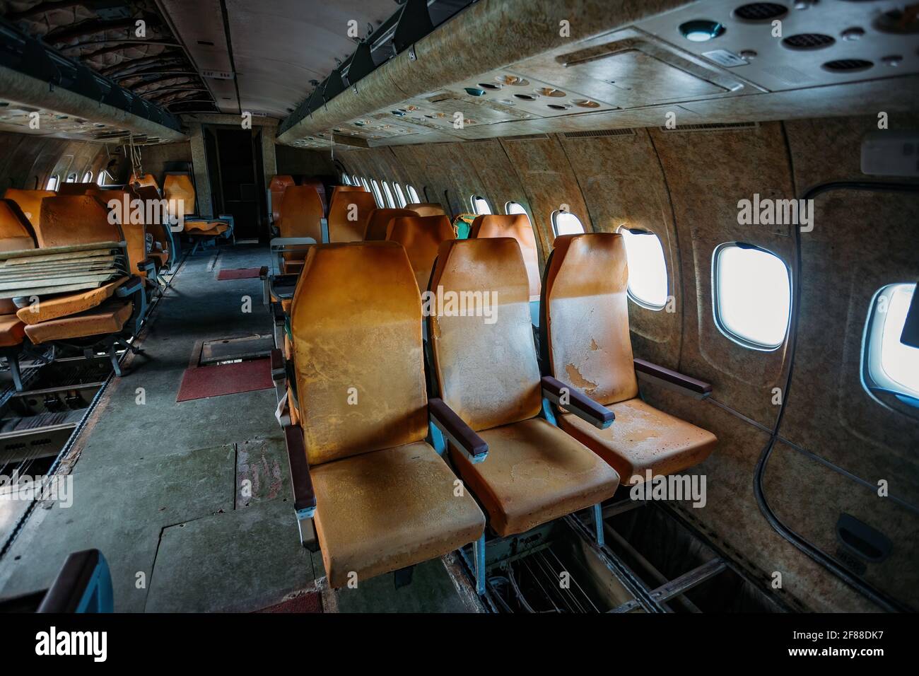 Inside of old abandoned passenger airplane. Plane wreck Stock Photo - Alamy