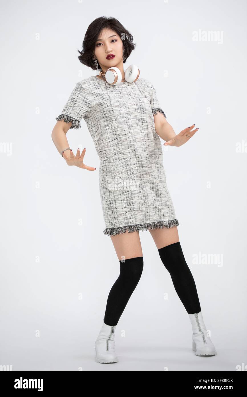 Cool young woman dancing Stock Photo - Alamy