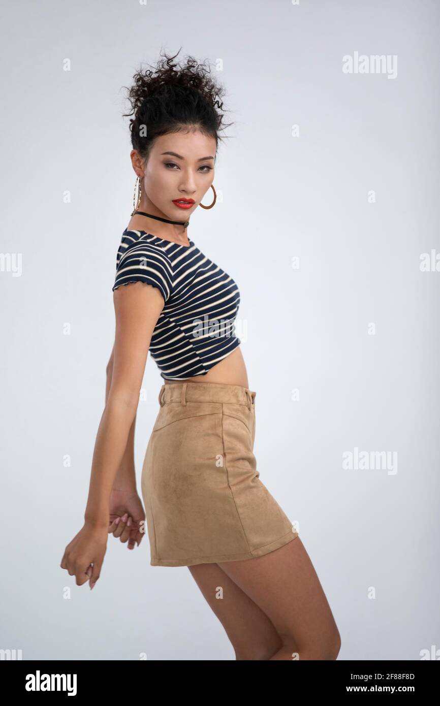 Cool young woman dancing Stock Photo - Alamy