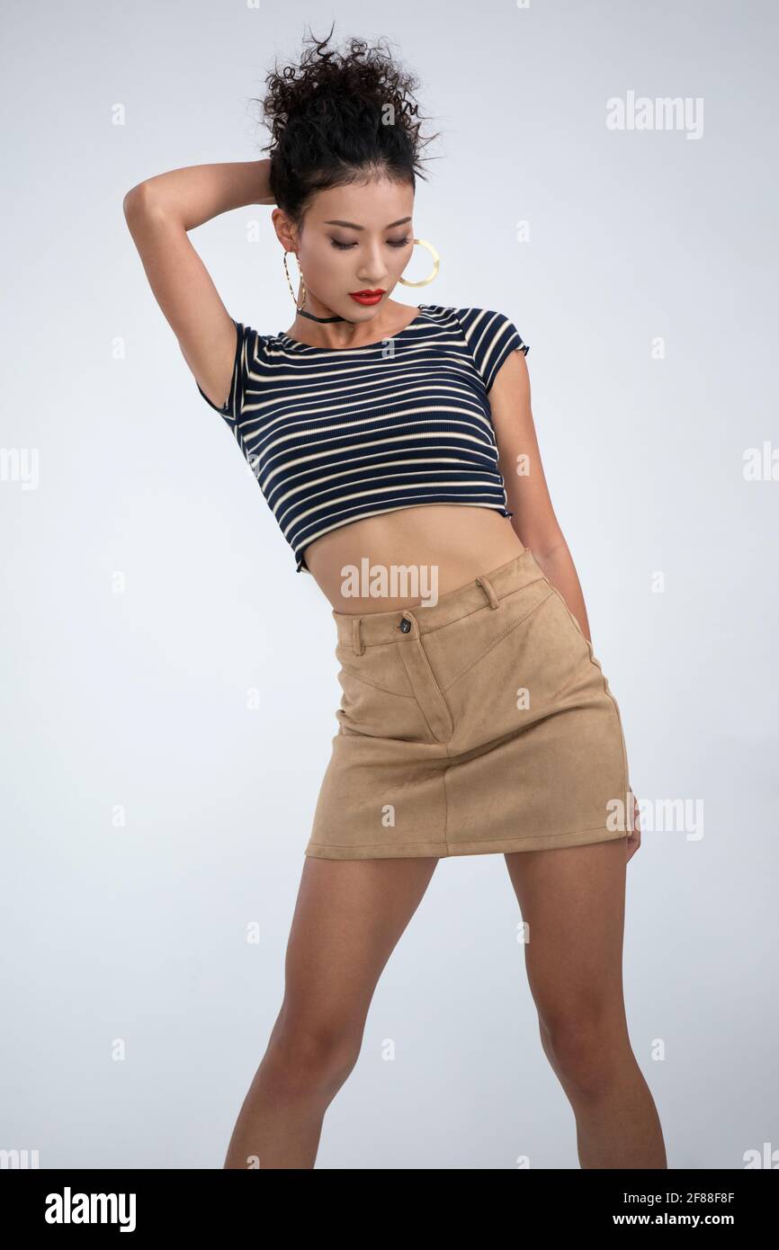 Cool young woman dancing Stock Photo - Alamy