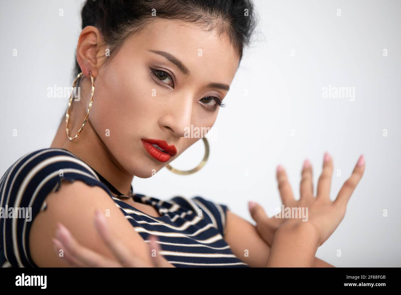 Cool young woman dancing Stock Photo - Alamy