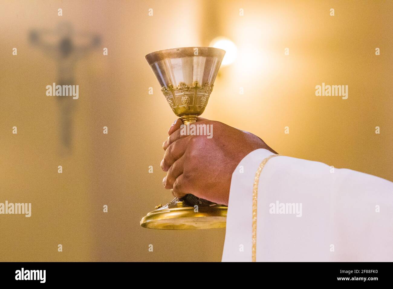 bread becomes the body of Christ in the hands of the pope, holy father ...