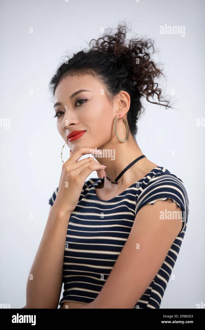 Fashionable young woman Stock Photo - Alamy