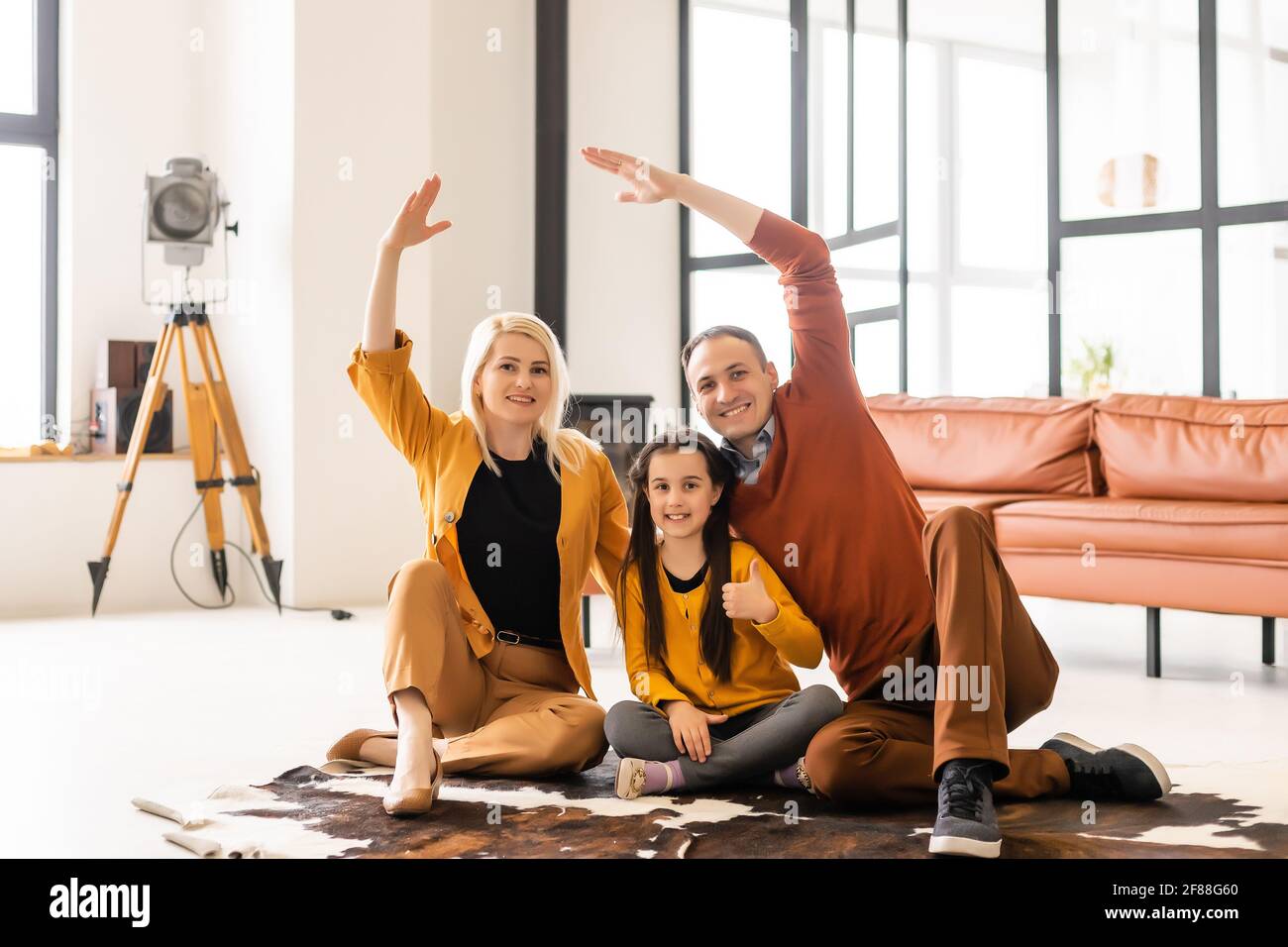 family in house planning with daughter Stock Photo - Alamy