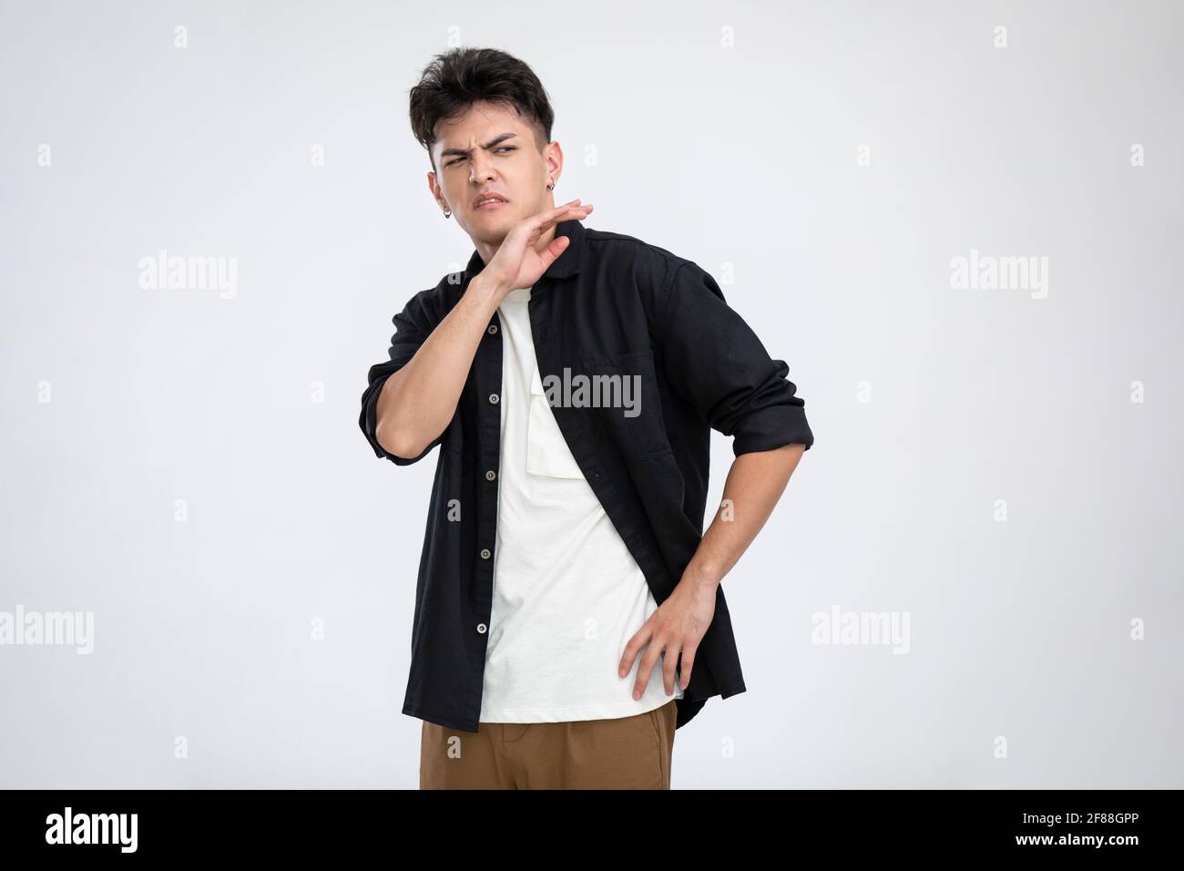 Young man showing rejection Stock Photo - Alamy