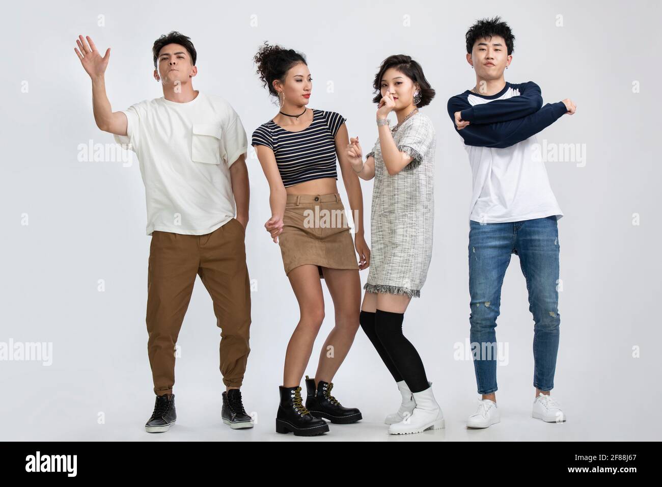 Fashionable young people dancing Stock Photo - Alamy