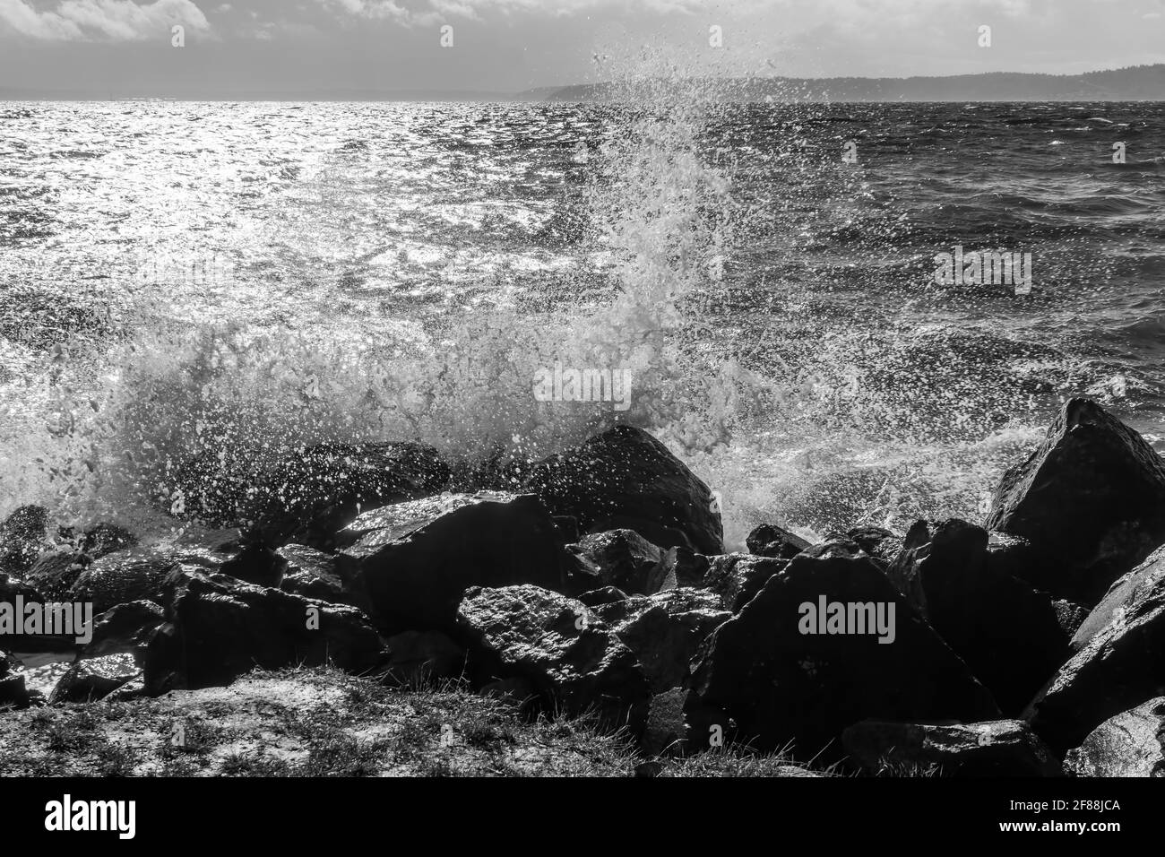 Wave crash on the shore at Saltwater State Park on a windy day Stock ...