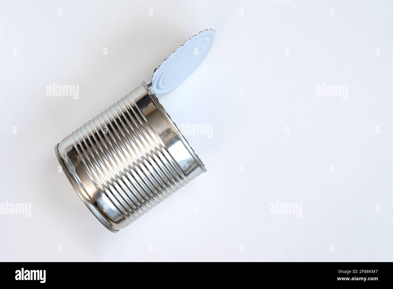 empty opened aluminum can isolated on white background Stock Photo - Alamy
