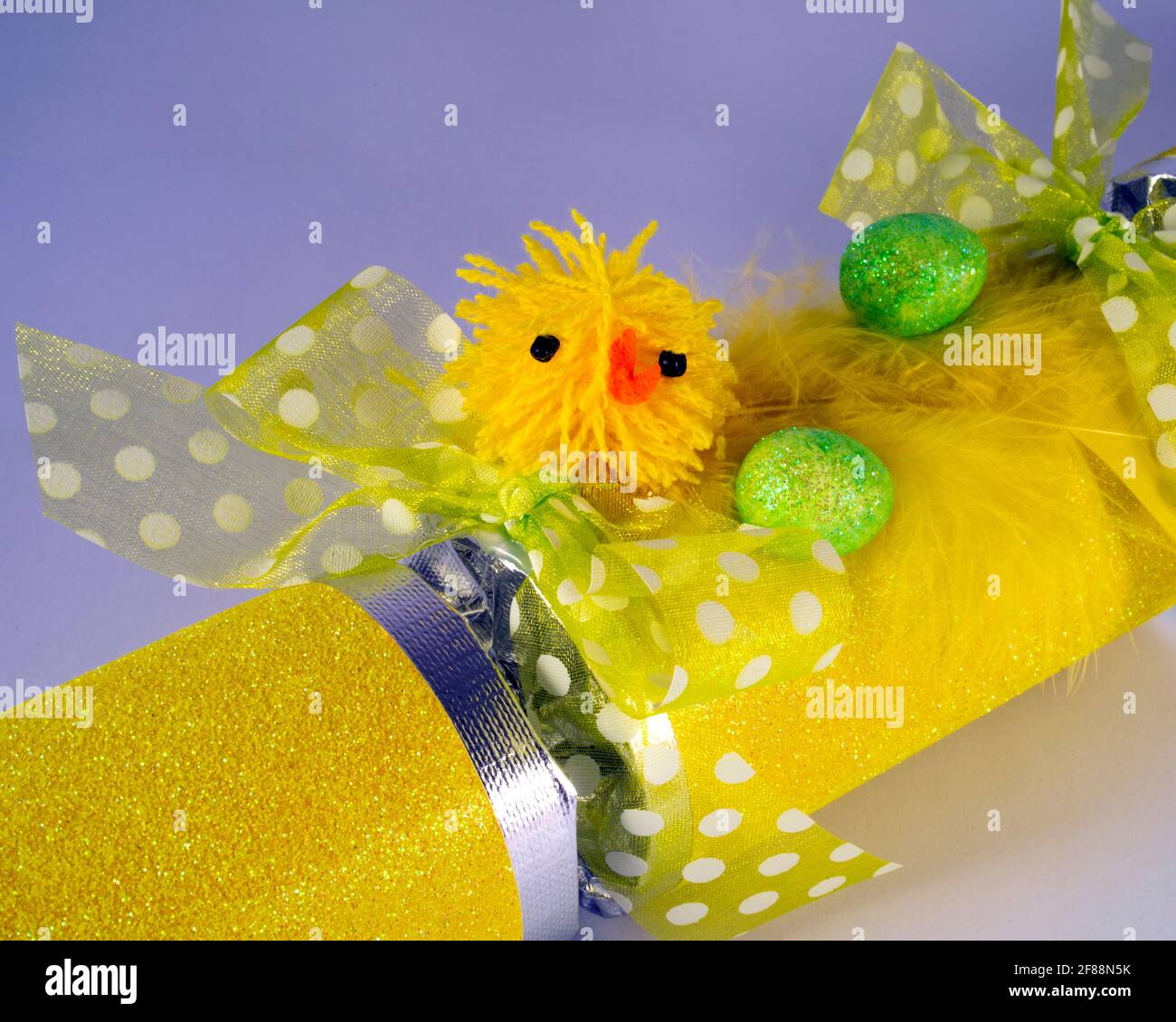 Pulling christmas cracker close up hi-res stock photography and images ...