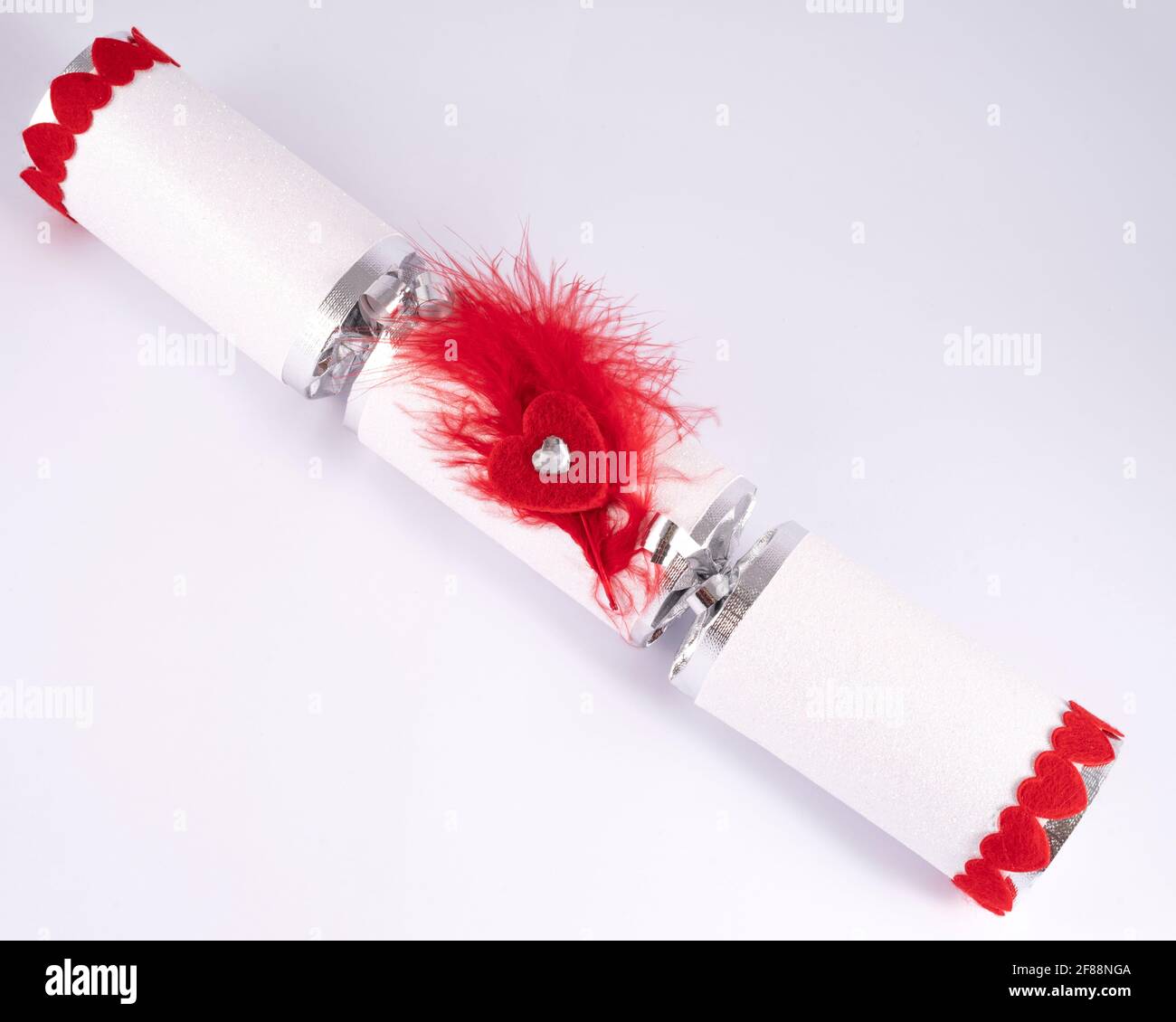 Pulling christmas cracker close up hi-res stock photography and images ...