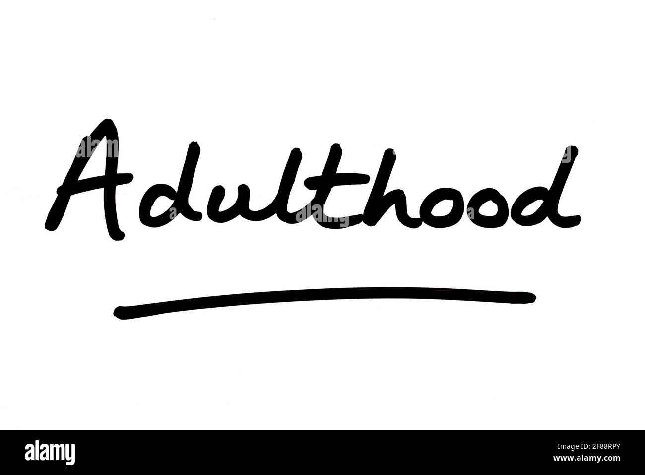 Adulthood, handwritten on a white background Stock Photo - Alamy