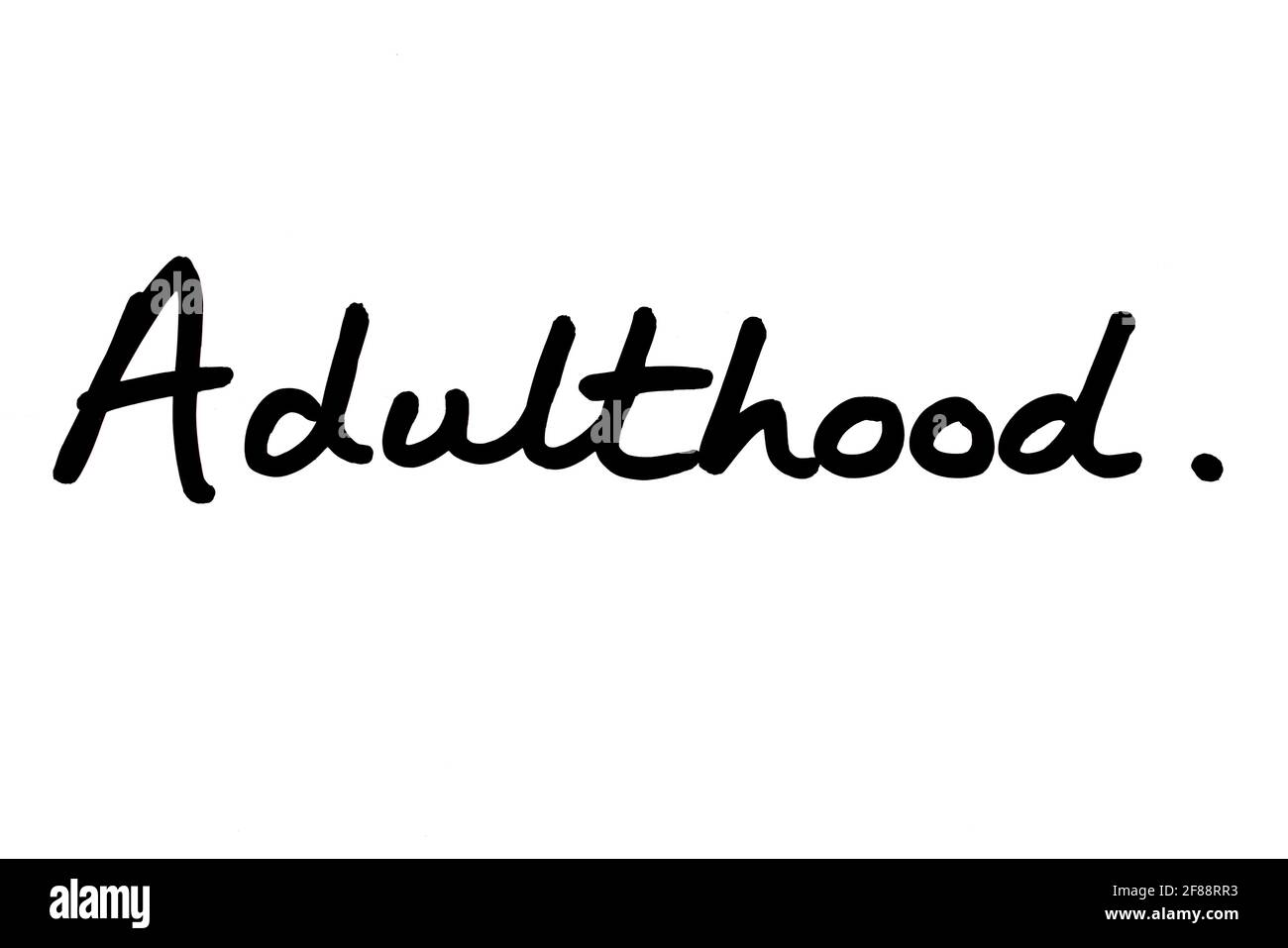 Adulthood, handwritten on a white background Stock Photo - Alamy
