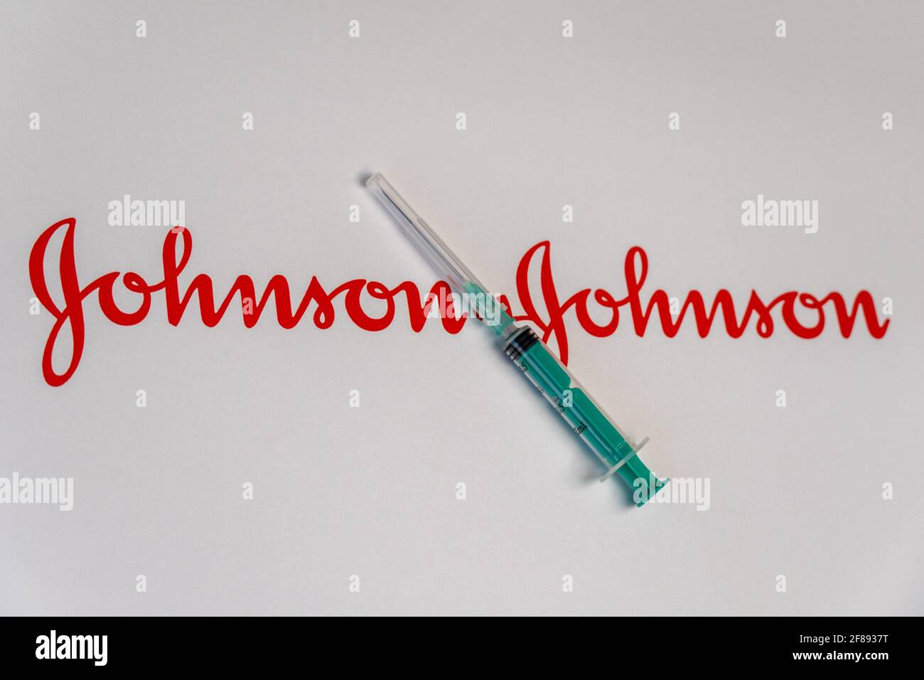Johnson and Johnson logo with syringe Stock Photo - Alamy