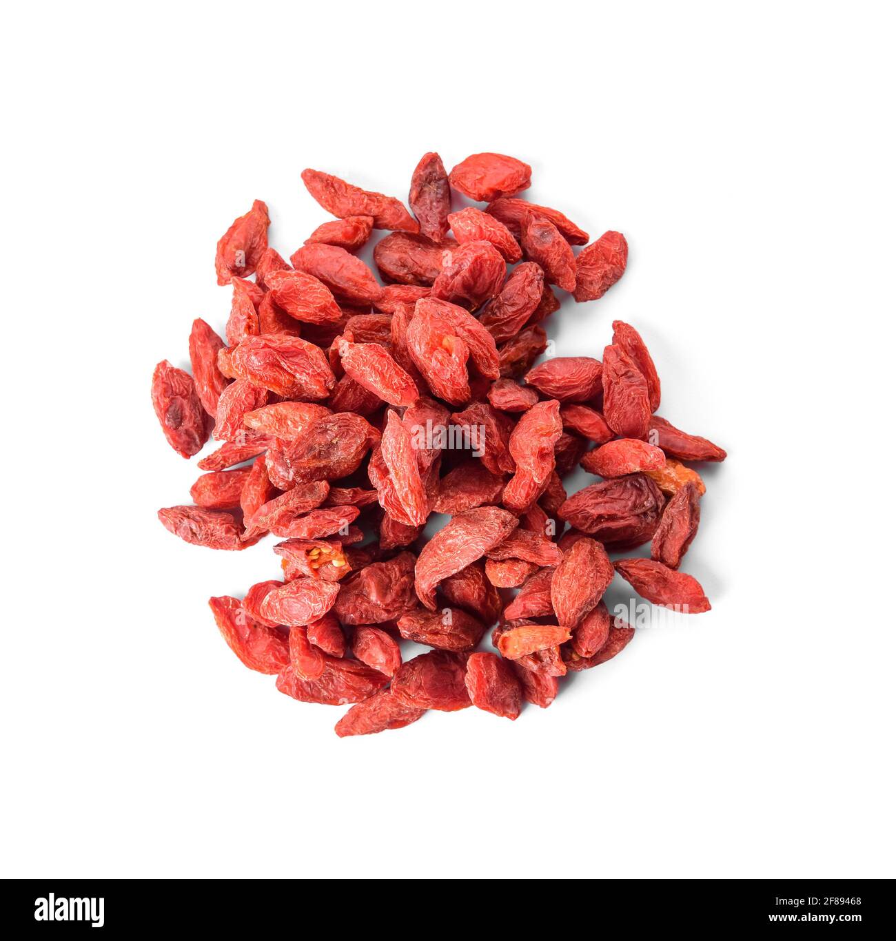 Dried goji berries on white background Stock Photo - Alamy