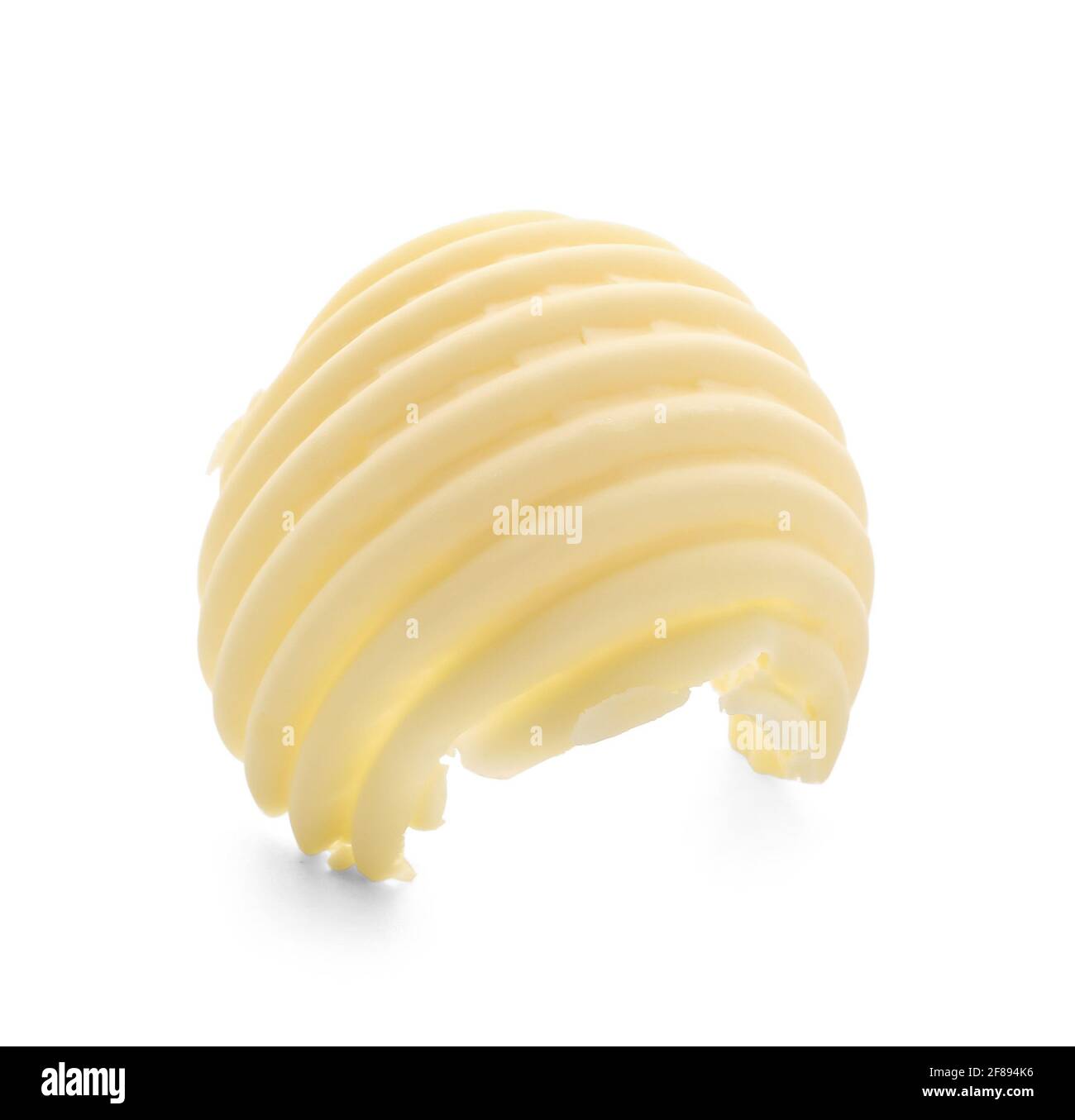 Curl of butter on white background Stock Photo - Alamy