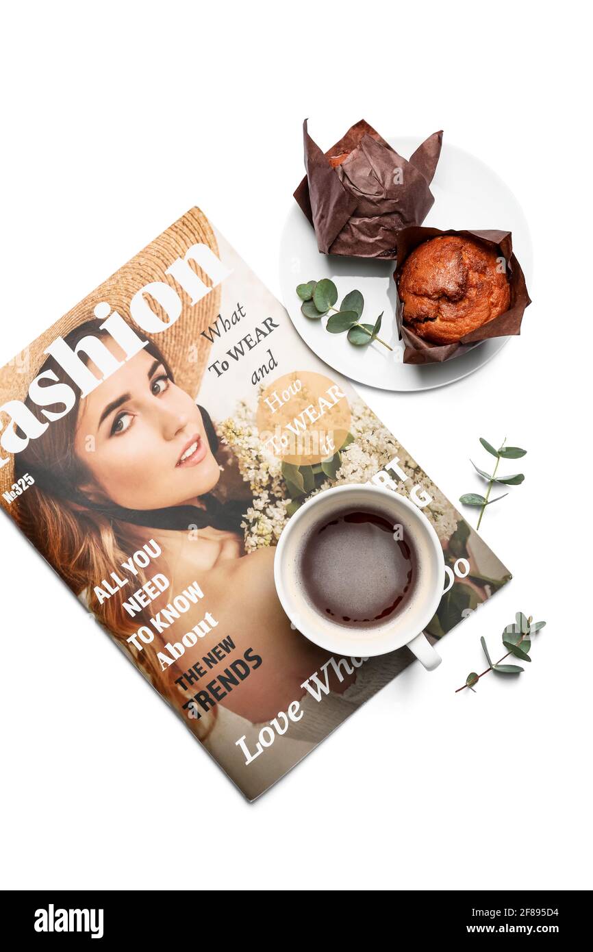 Cup of coffee with magazine on white background Stock Photo - Alamy